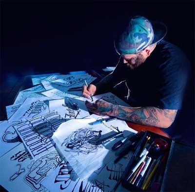 Available Now: Big Meas' Iron Sharpens Iron! TattooNOW