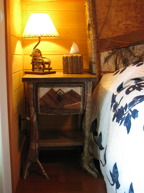 The front drawer and birch bark replicate the beautiful White Mountains ...